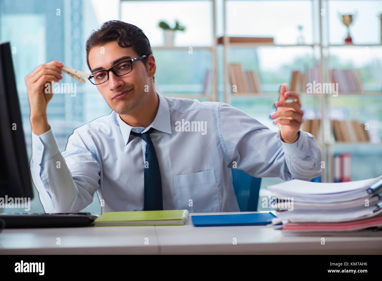 Businessman suffering from excessive armpit sweating Stock Photo - Alamy