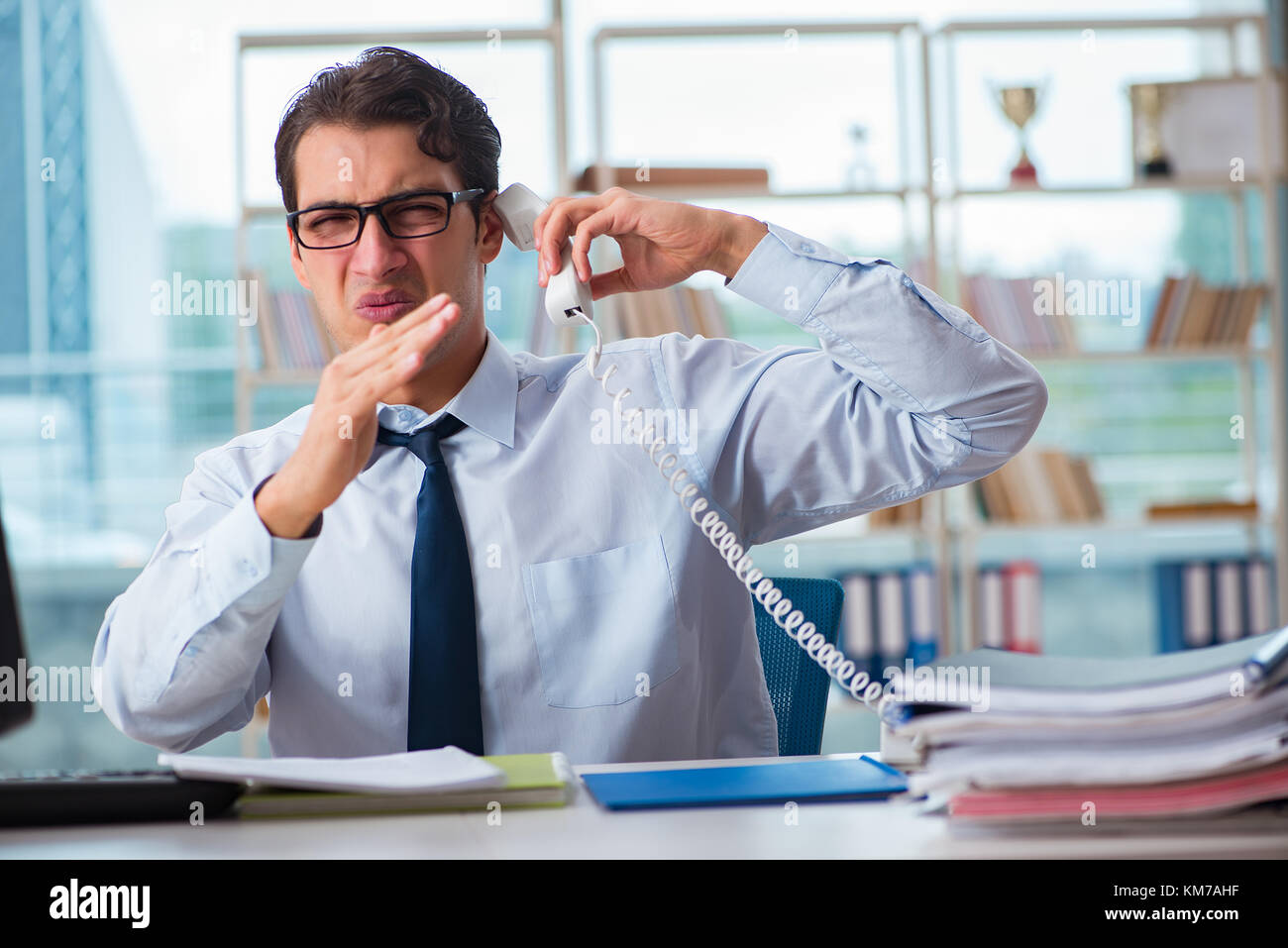 Businessman suffering from excessive armpit sweating Stock Photo - Alamy