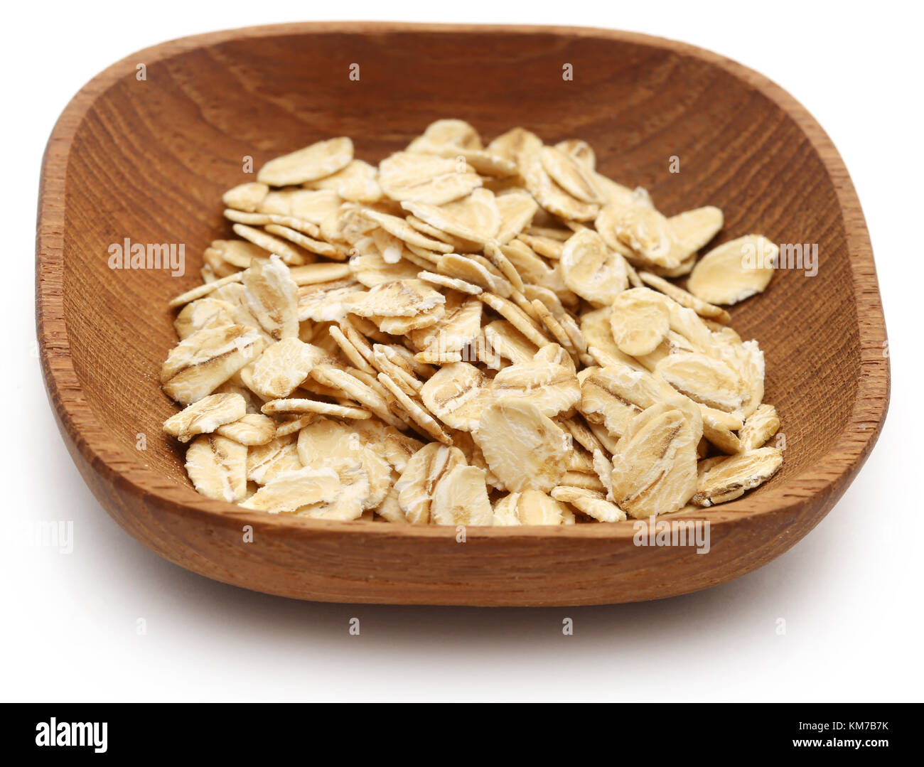 Fresh organic oats in a bowl isolated over white background Stock Photo ...