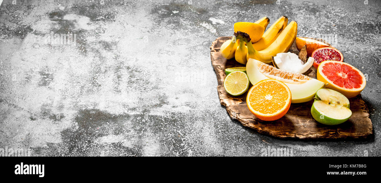 variety of fresh fruits. On rustic background Stock Photo - Alamy