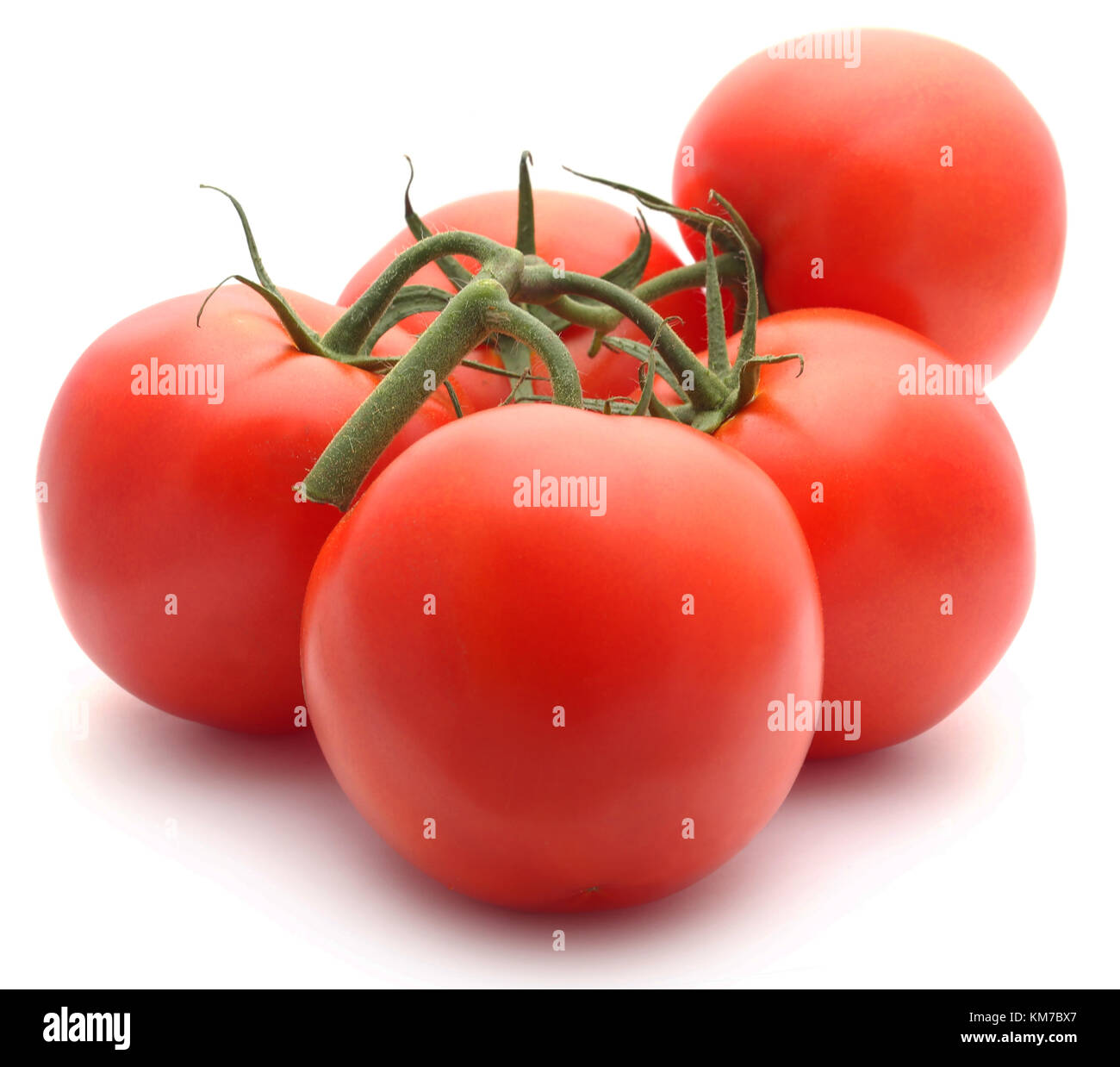Fresh organic tomato isolated over white background Stock Photo - Alamy