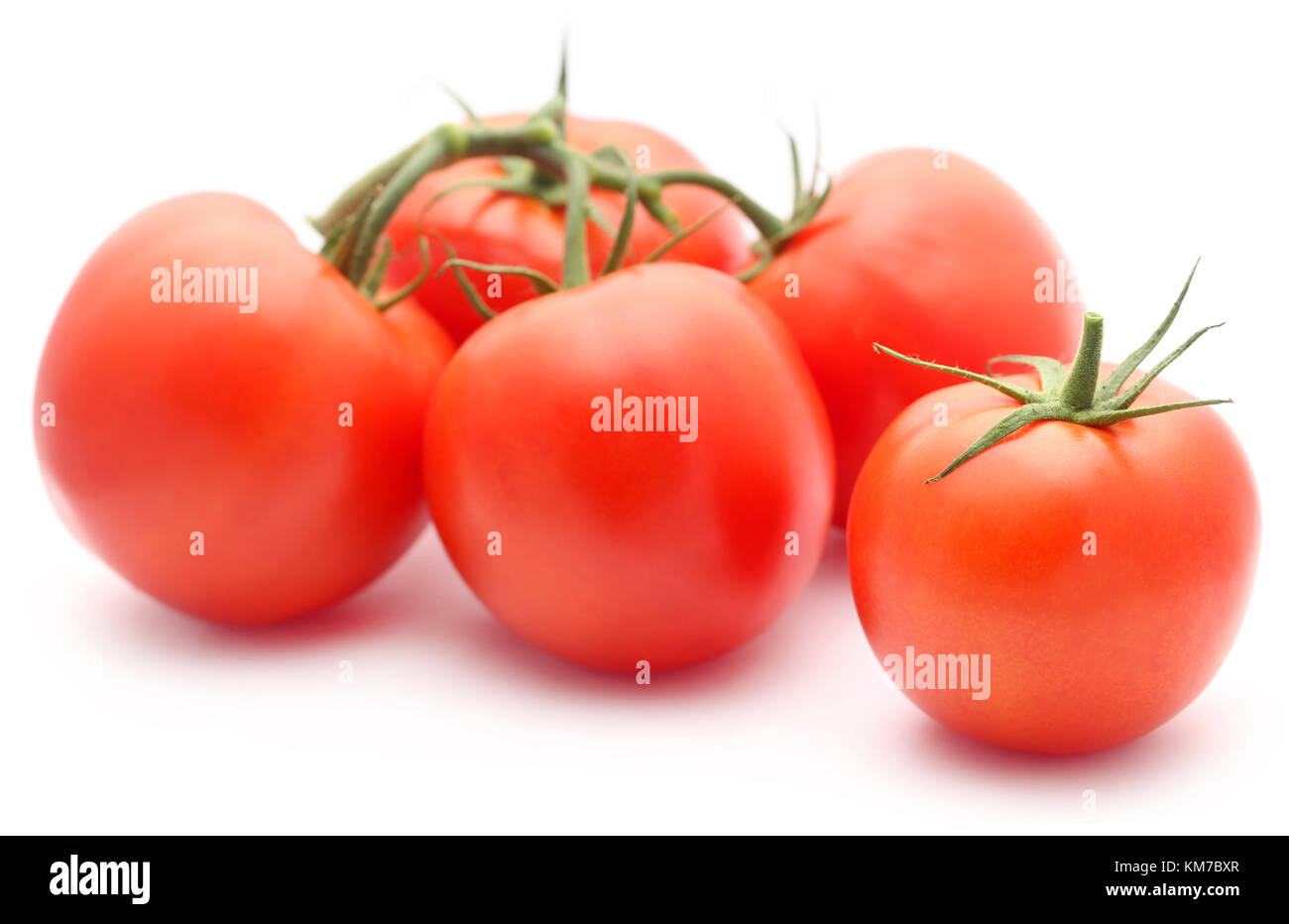 Fresh organic tomato isolated over white background Stock Photo - Alamy