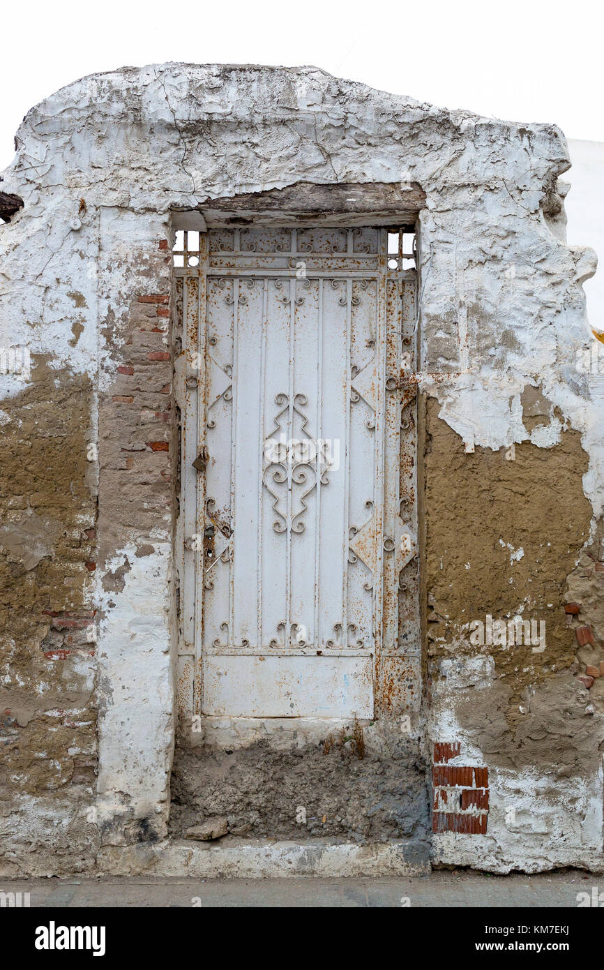 Demolished house with only gate and parts of wall left standing Stock ...