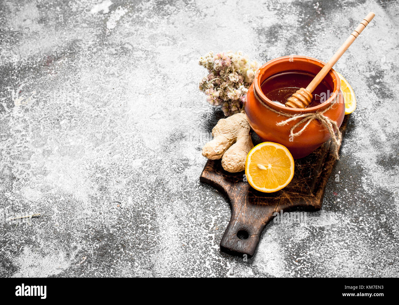 Honey background. Honey with ginger, lemon and herbs. On rustic ...