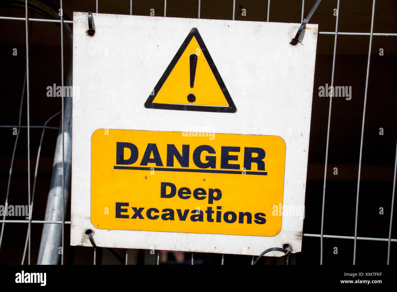 A warning sign telling people of deep excavation Stock Photo - Alamy