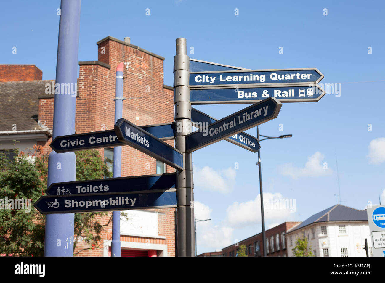 Road sign with many directions Stock Photo - Alamy