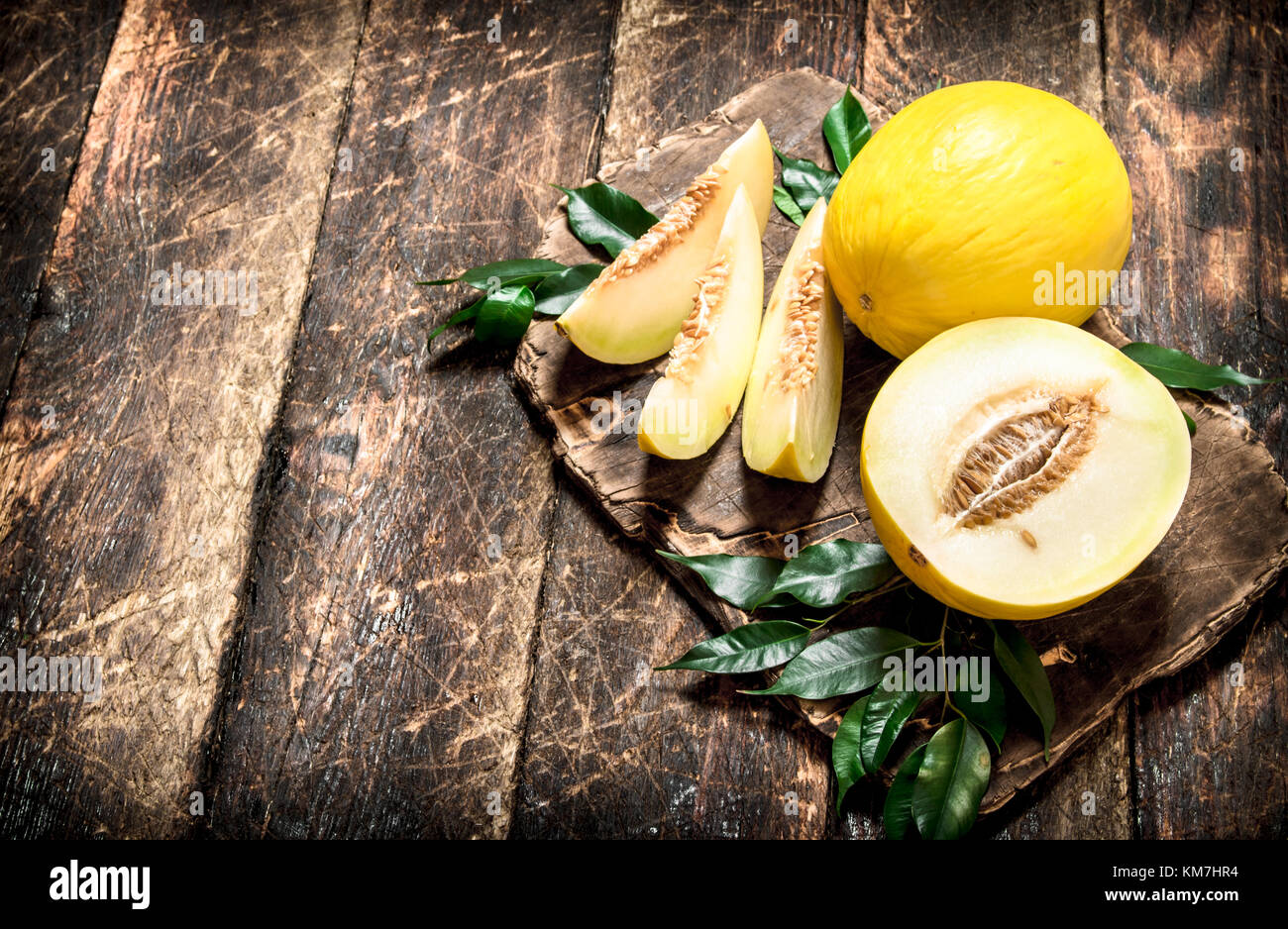 Fresh, fragrant melon. On the wooden background Stock Photo - Alamy