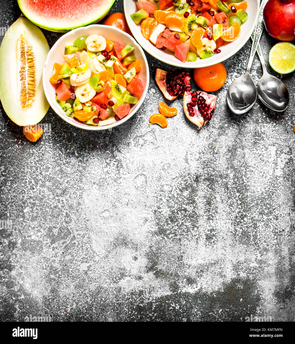 Tropical food . Fresh salad of fruits. On rustic background Stock Photo ...