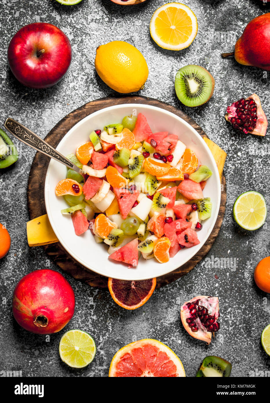 Tropical food . A tropical fruit salad. On rustic background Stock ...