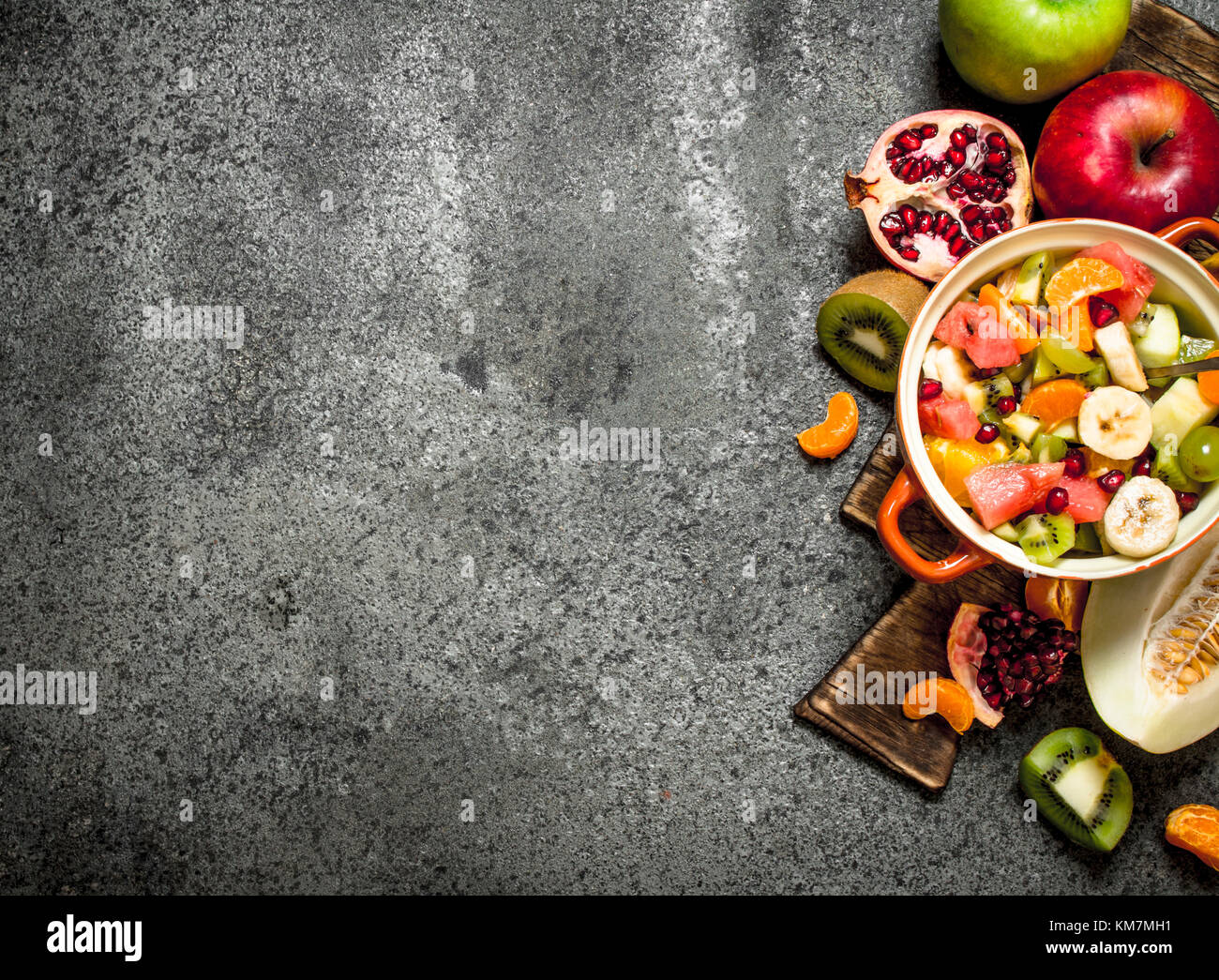Tropical food . Tropical fruit salad. On rustic background Stock Photo ...