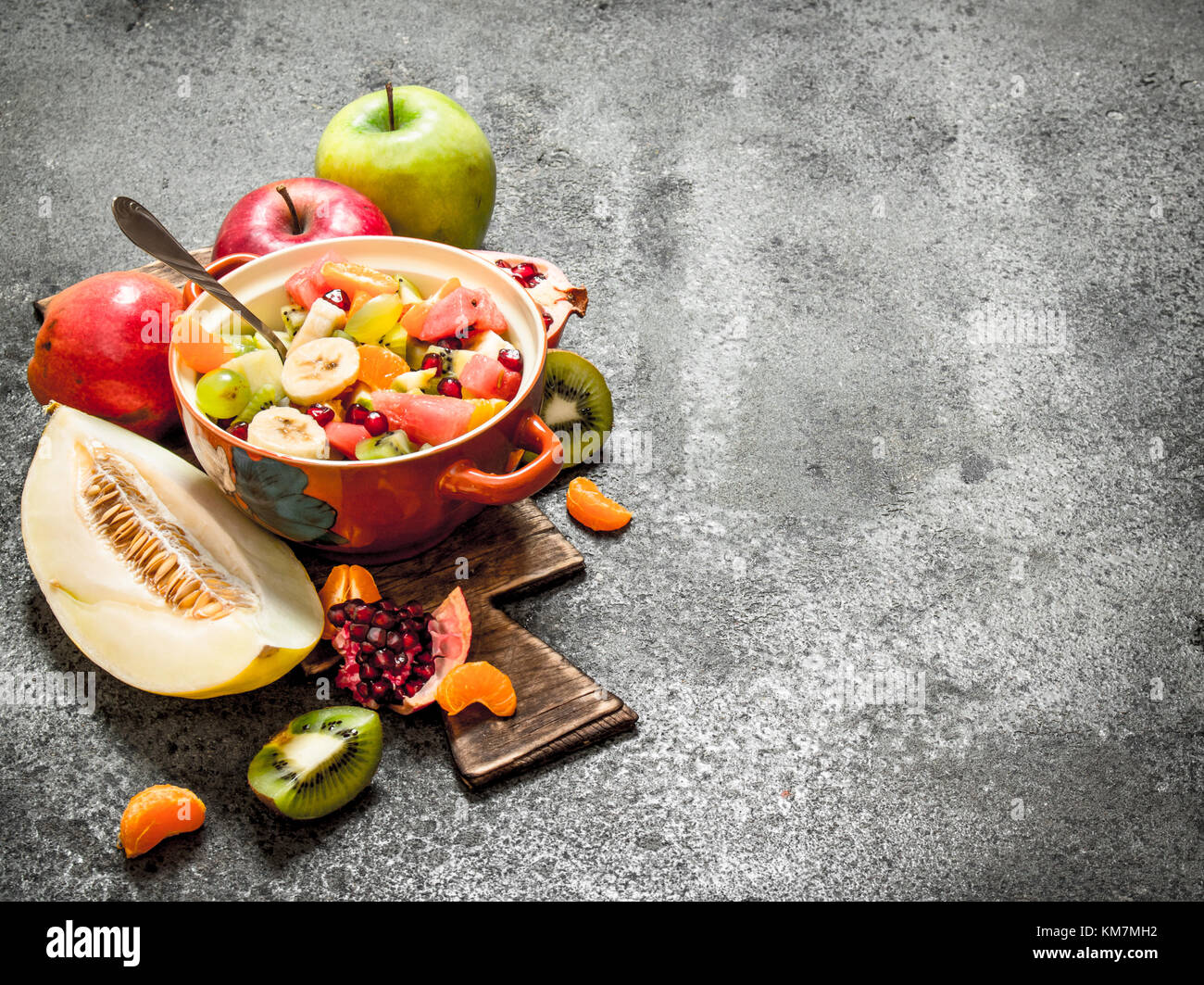 Tropical food . Tropical fruit salad. On rustic background Stock Photo ...