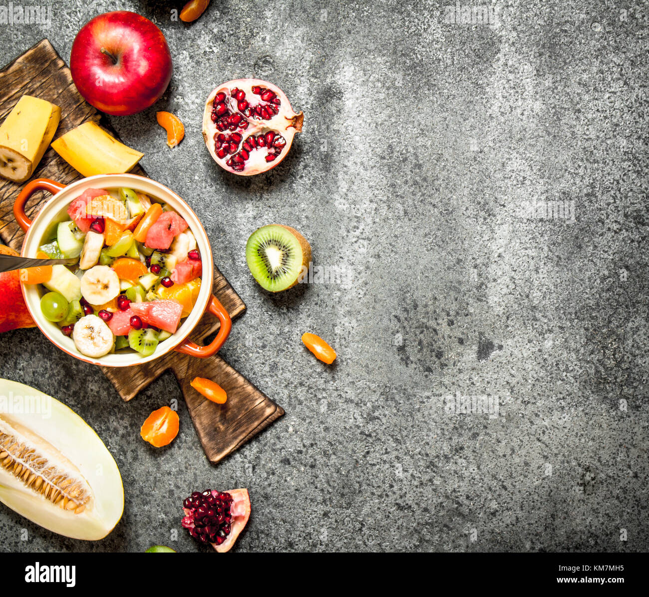 Tropical food . Tropical fruit salad. On rustic background Stock Photo ...