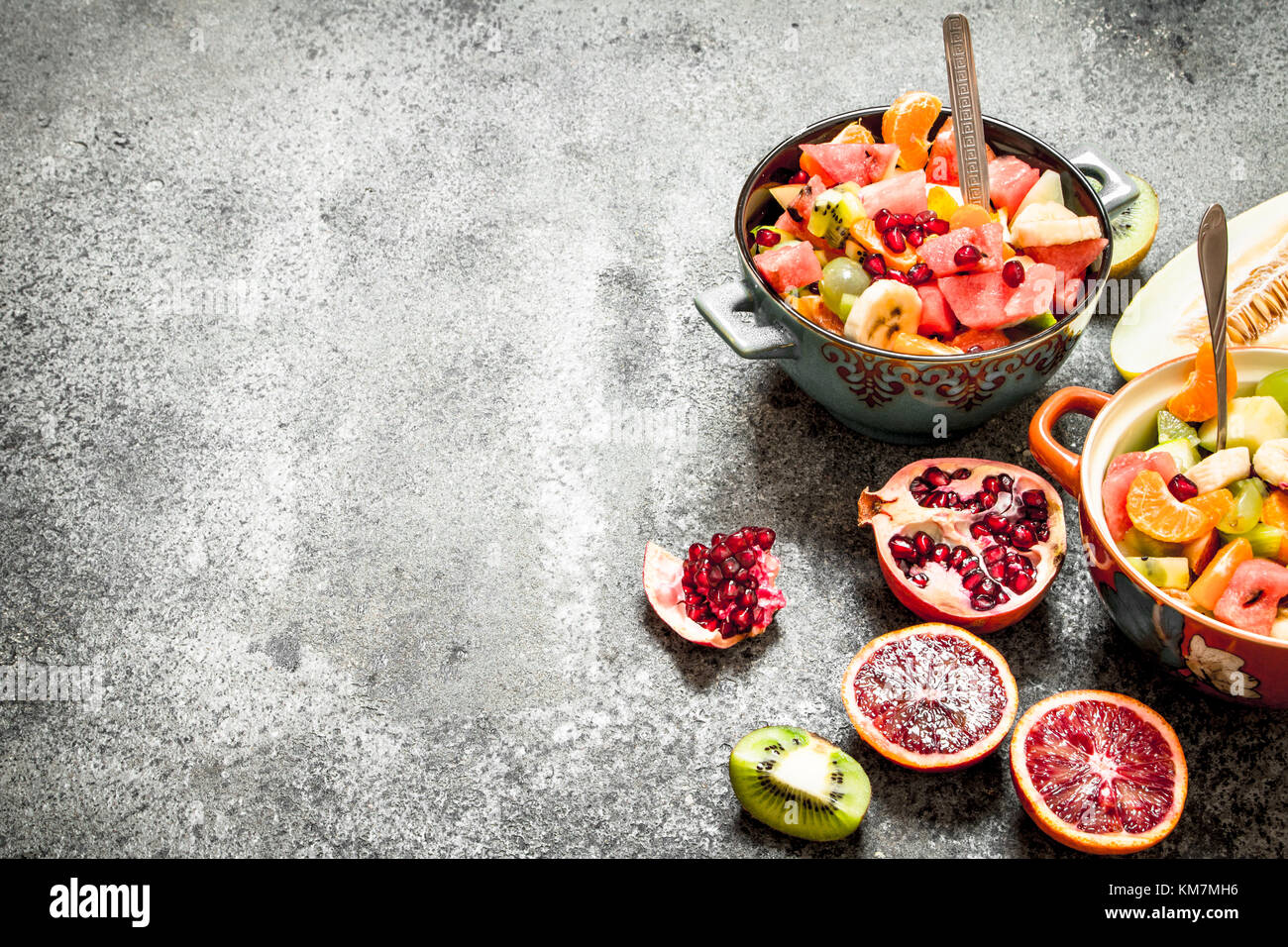 Tropical food . Tropical fruit salad. On rustic background Stock Photo ...