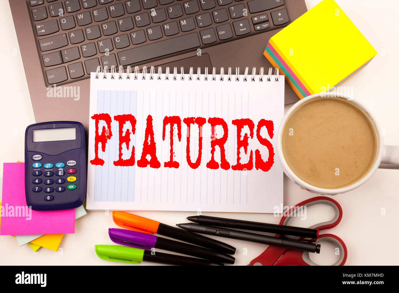 Word writing Features in the office with laptop, marker, pen ...