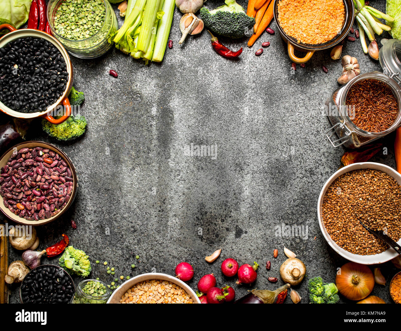 Organic Food. Frame of fresh vegetables and legumes. On rustic ...