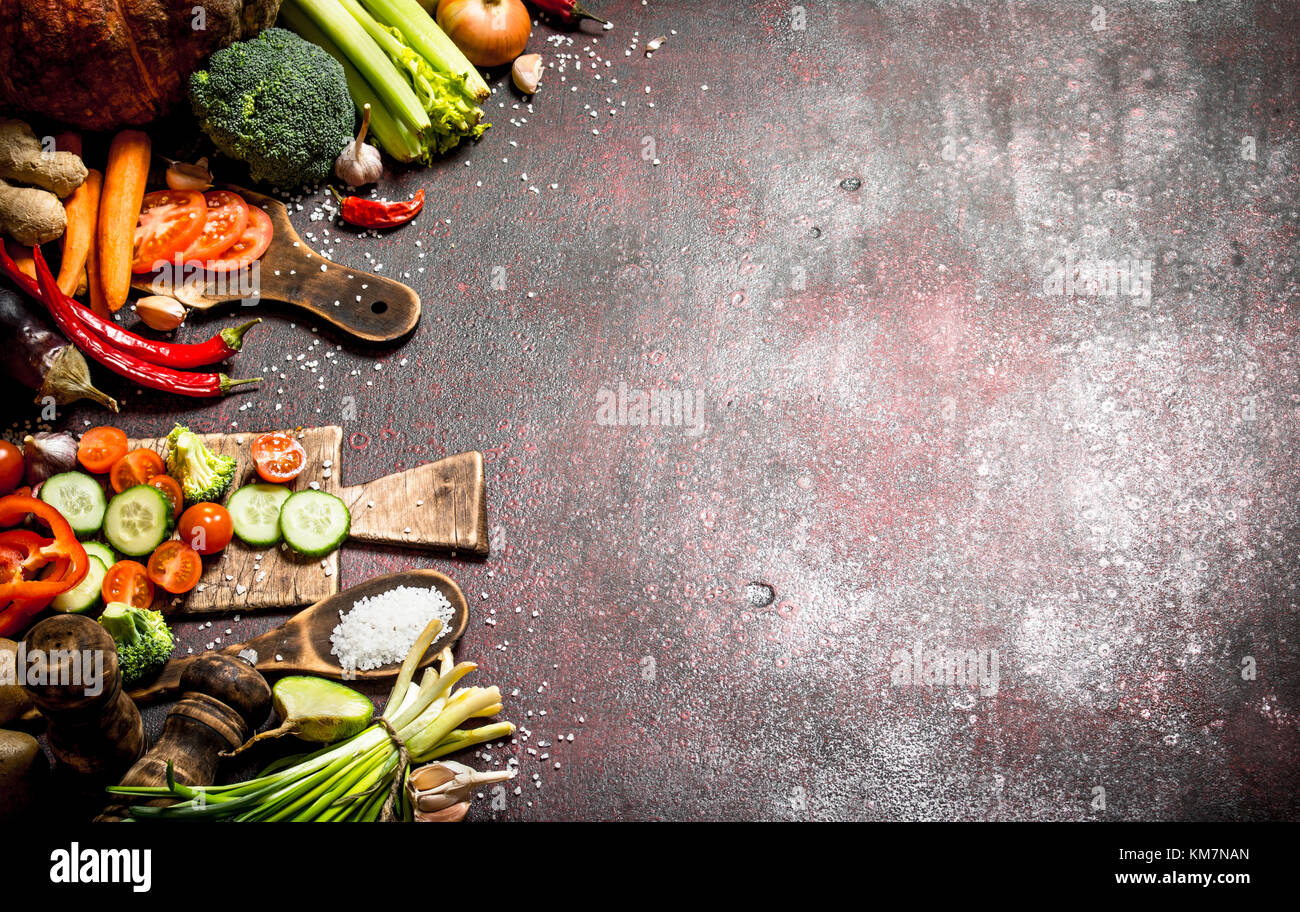 Organic Food. A variety of fresh vegetables. On rustic background Stock ...