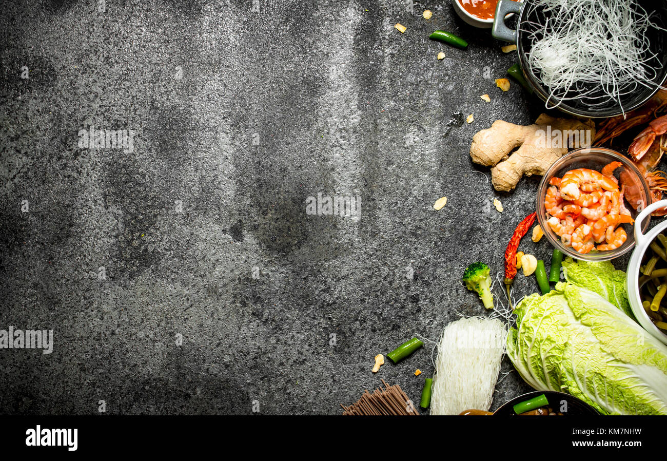 Asian food. A variety of ingredients for cooking Asian food on rustic ...