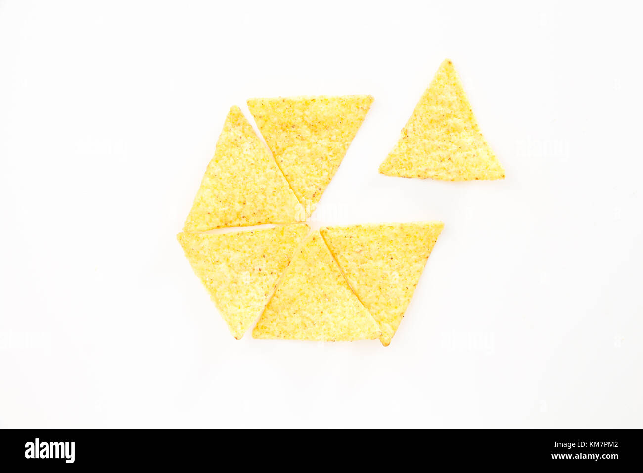 Crispy nacho chips in like flower shape, on white background Stock ...