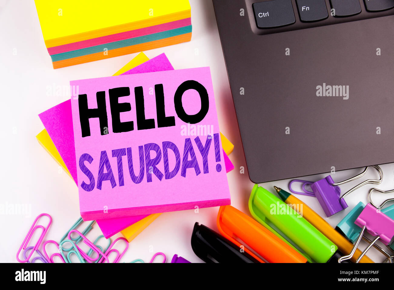 Writing text showing Saturday made in the office with surroundings such ...