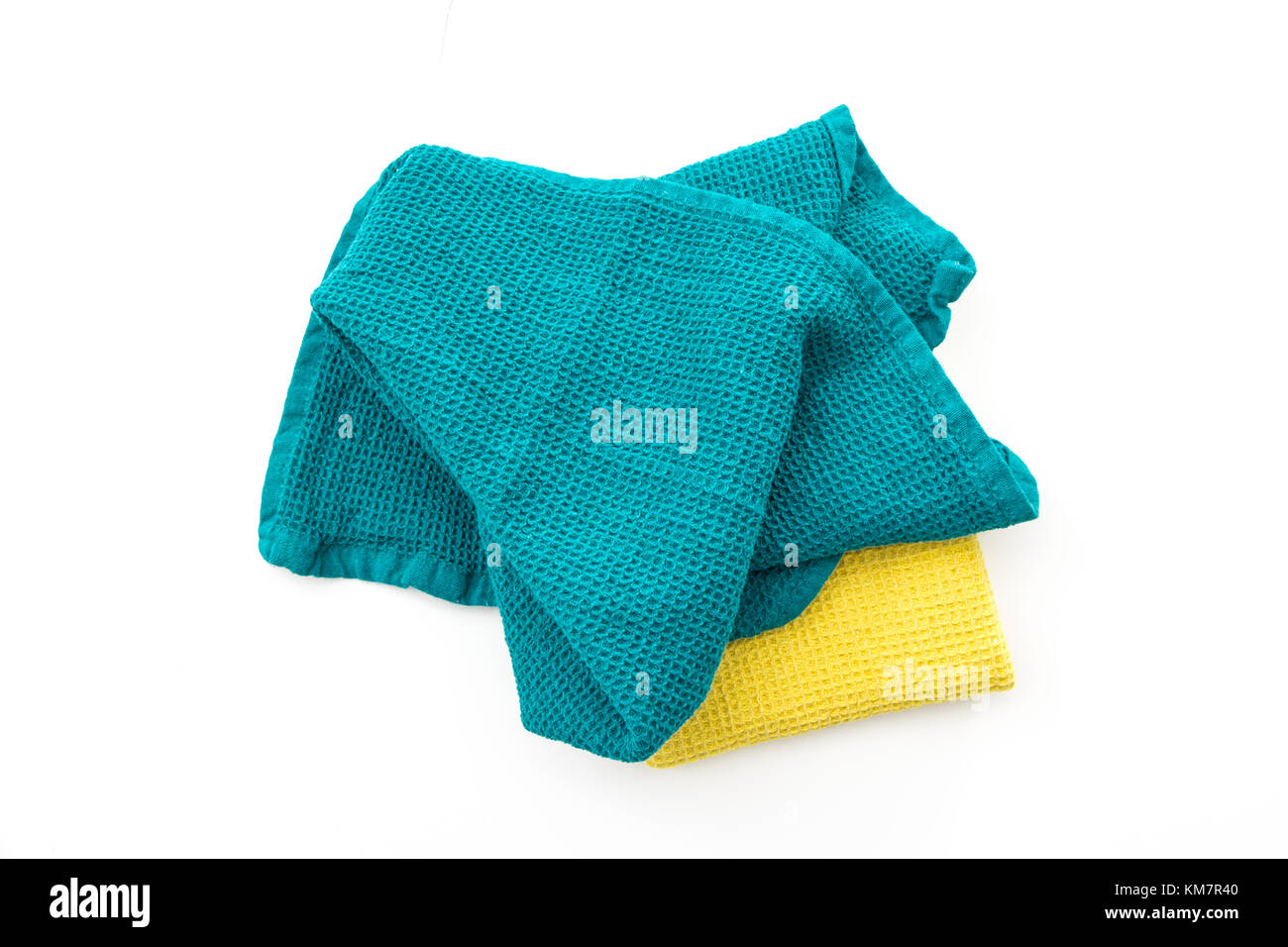 Messy and folded colorful kitchen towels, on white background Stock ...