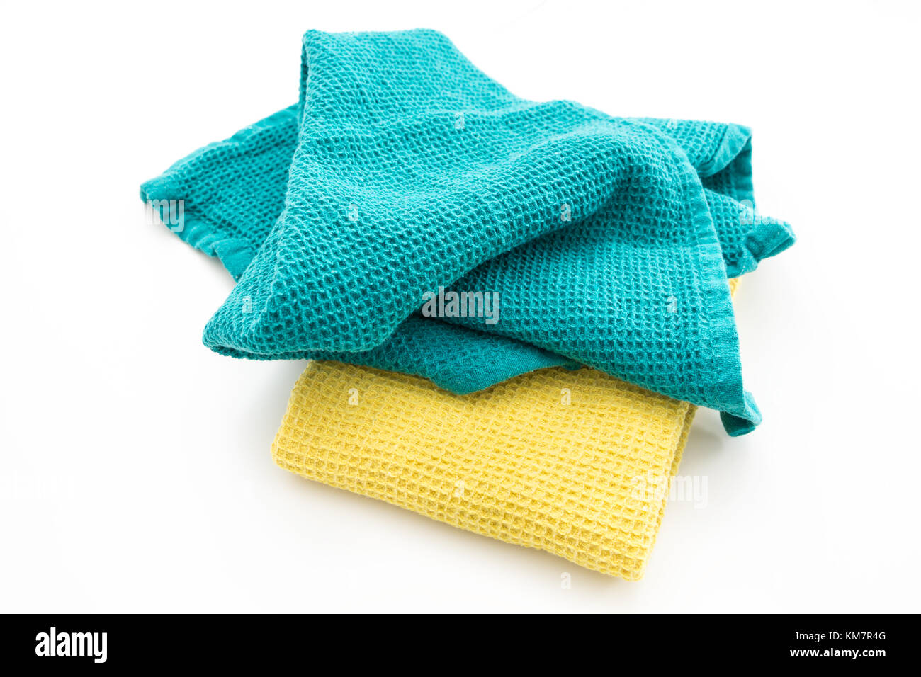 Messy and folded colorful kitchen towels, on white background Stock ...