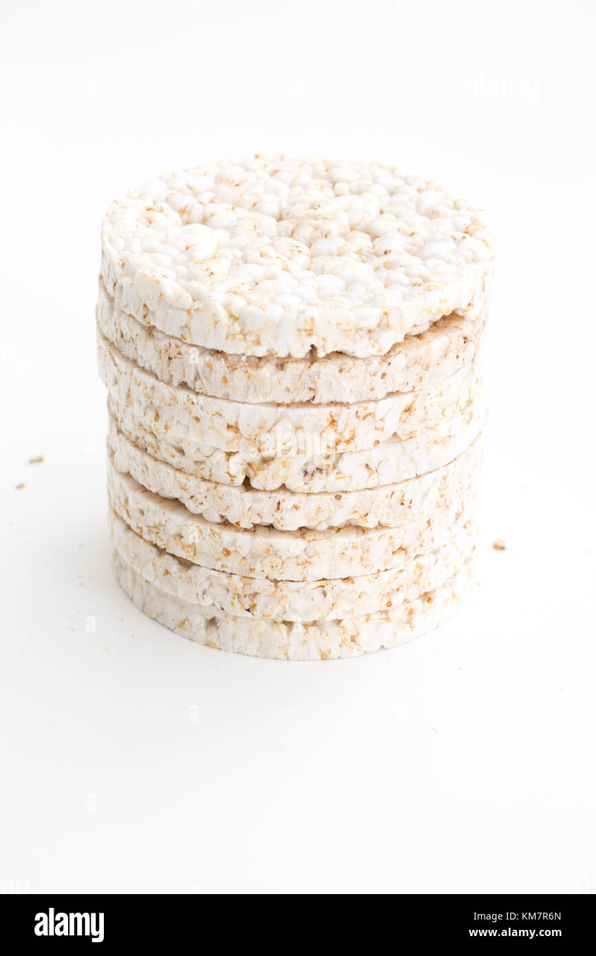 Round rice cakes/ crackers, on white background Stock Photo - Alamy