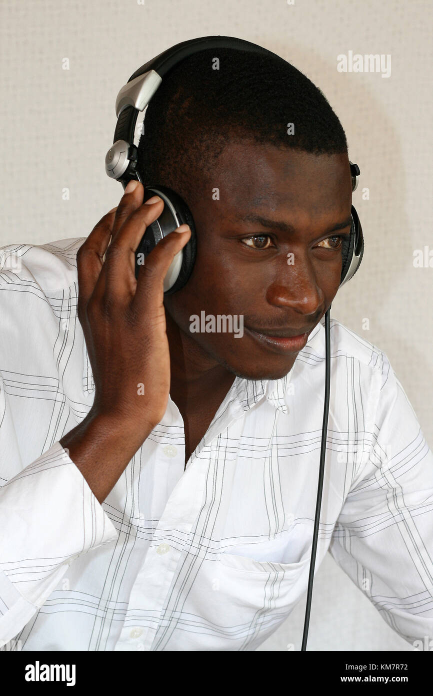 African man with headphones Stock Photo - Alamy