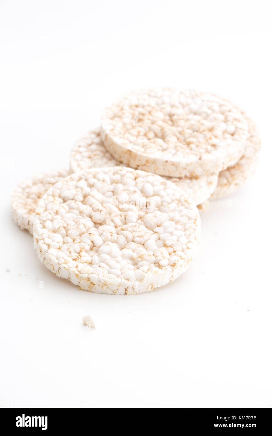 Round rice cakes/ crackers, on white background Stock Photo - Alamy