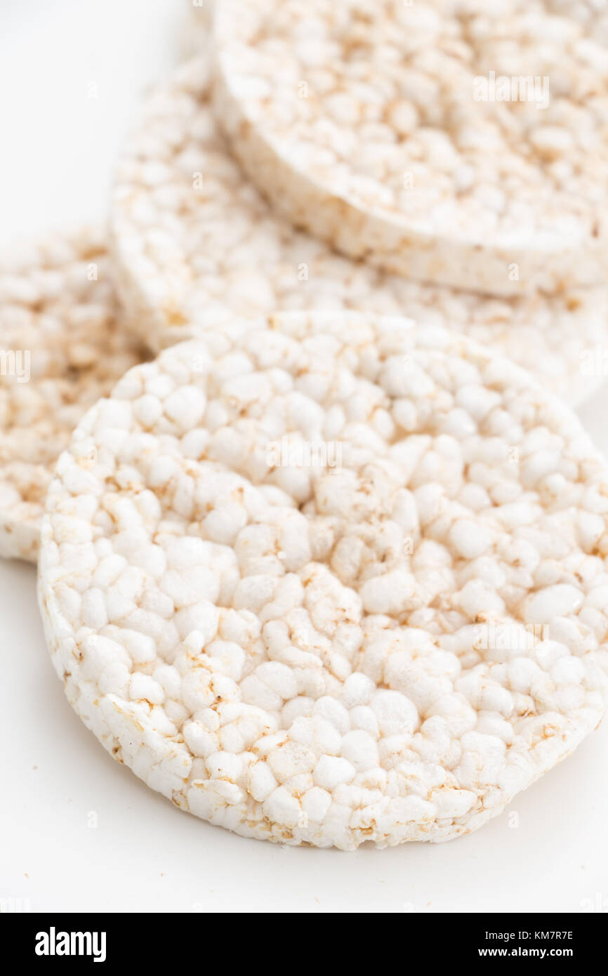 Round rice cakes/ crackers, on white background Stock Photo - Alamy