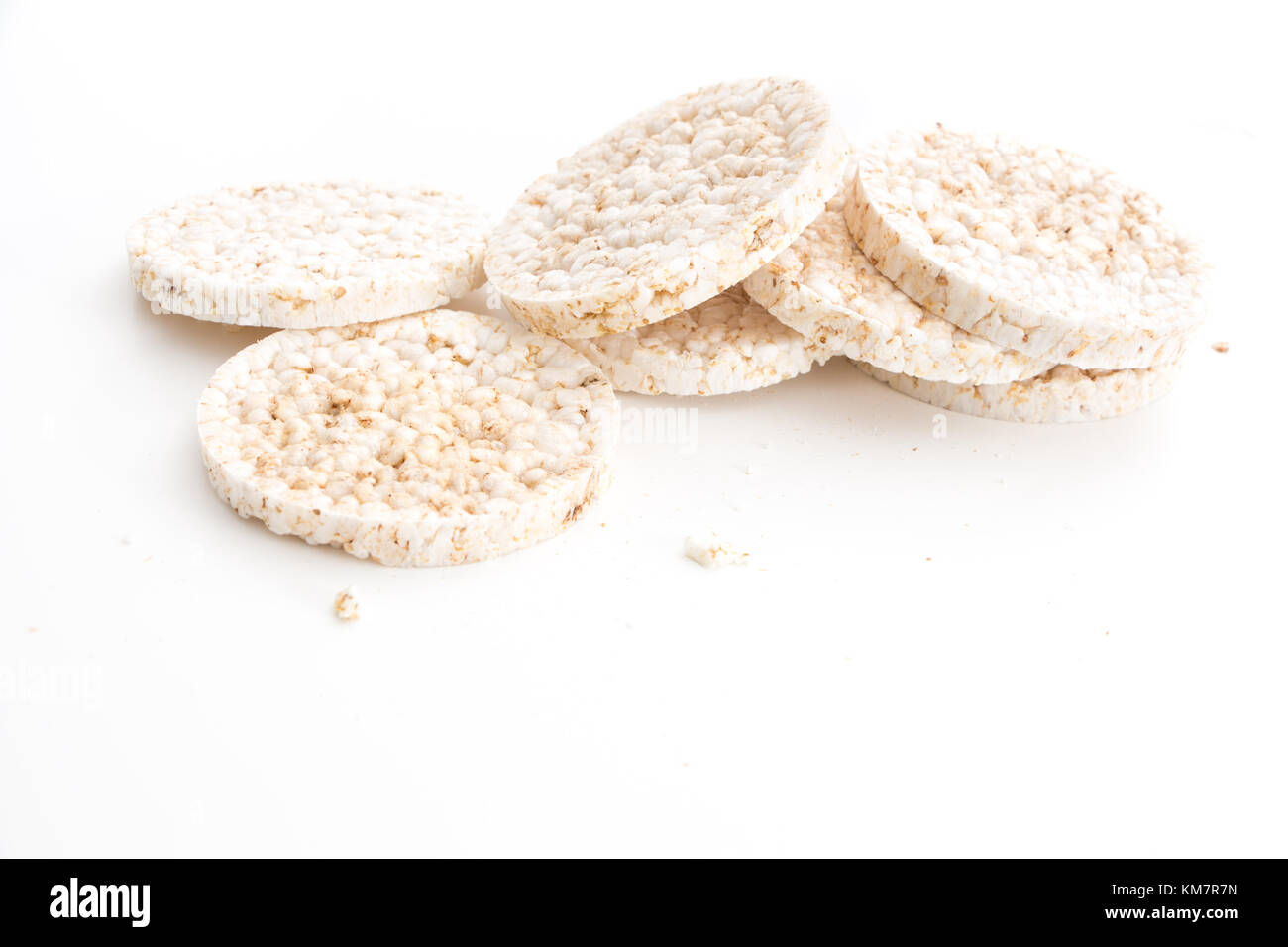 Round rice cakes/ crackers, on white background Stock Photo - Alamy