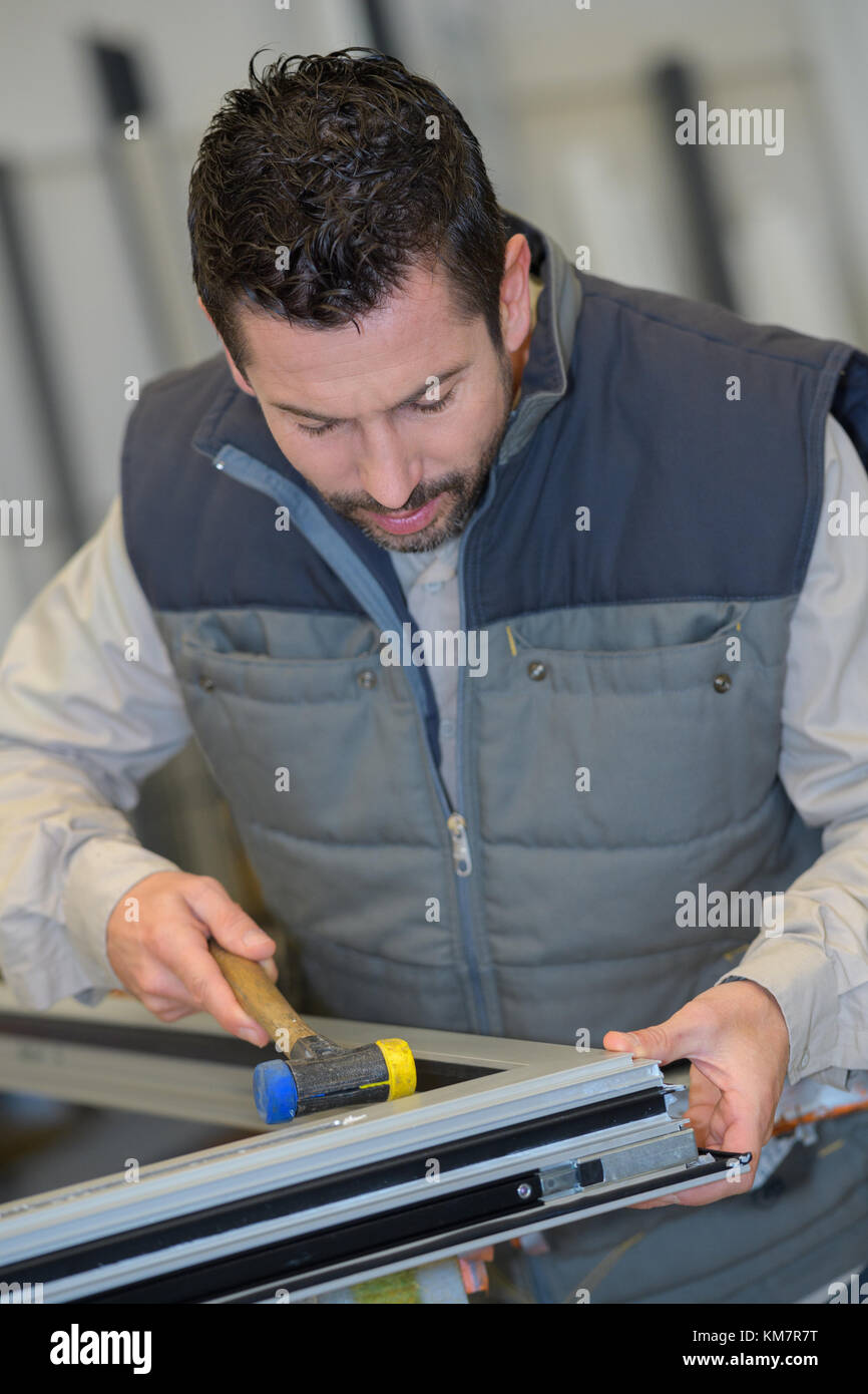 using tools repairing to fix car window Stock Photo - Alamy
