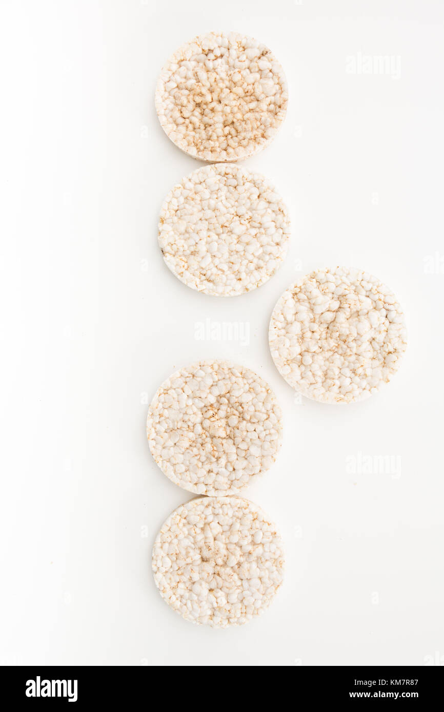 Round rice cakes/ crackers, on white background Stock Photo - Alamy