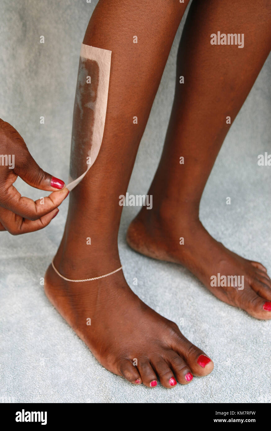 African woman waxing Stock Photo - Alamy