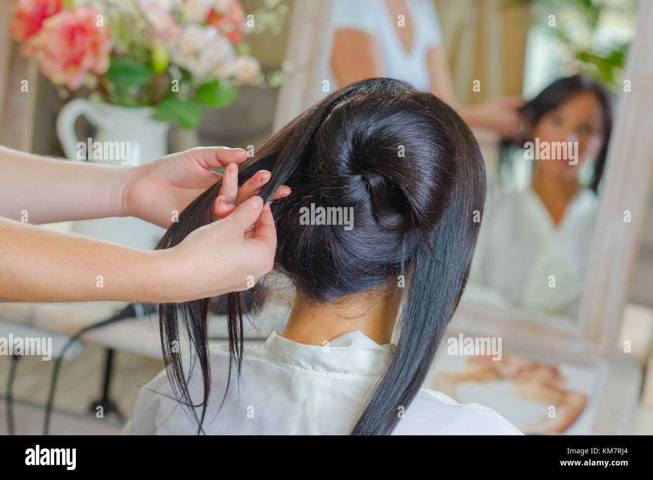 Woman having her hair done Stock Photo - Alamy