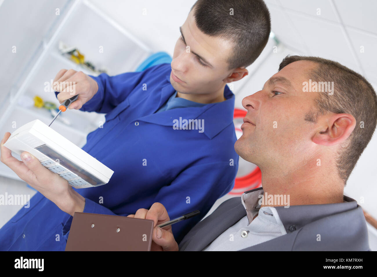 technicians stand in industry Stock Photo - Alamy