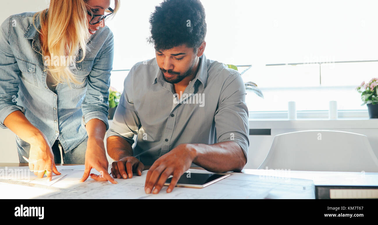 Business People and architects working on project together Stock Photo ...