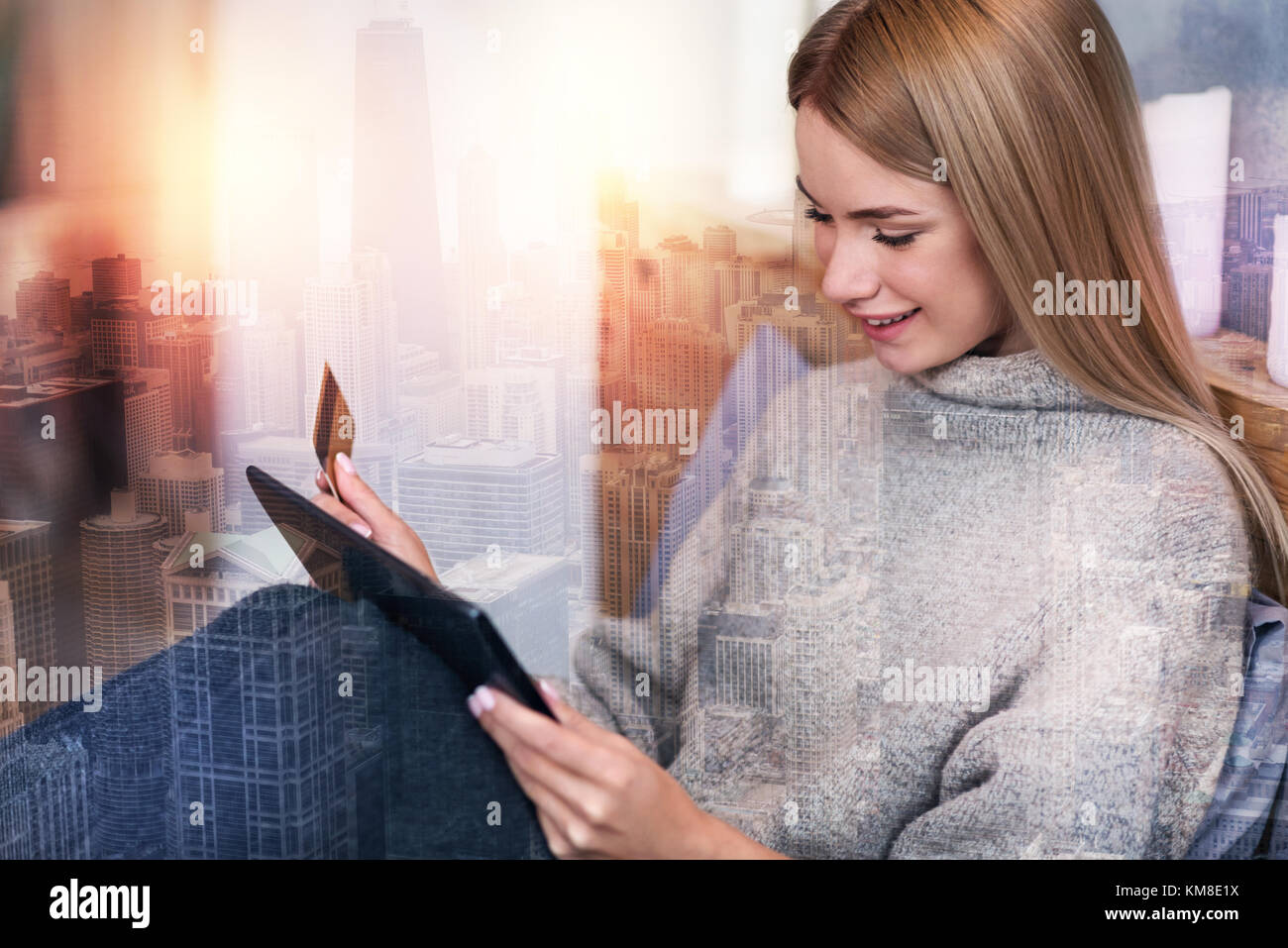 Happy nice woman using Internet Stock Photo - Alamy