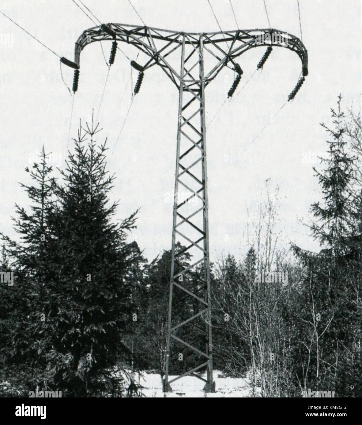 This image from 1918 shows an early power transmission line ...
