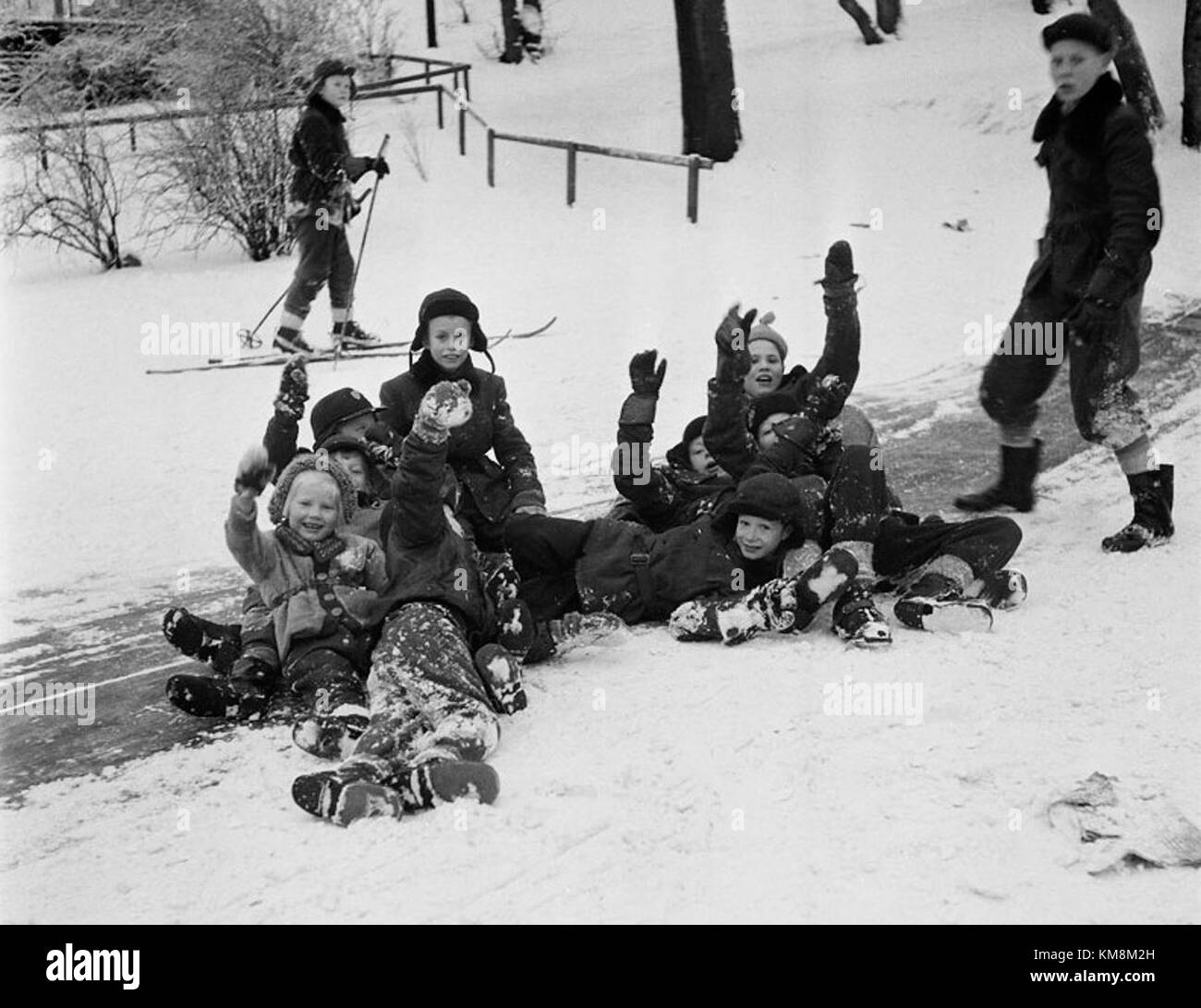 Parklek Vinter 1953 shows a winter scene in a Swedish park during the ...