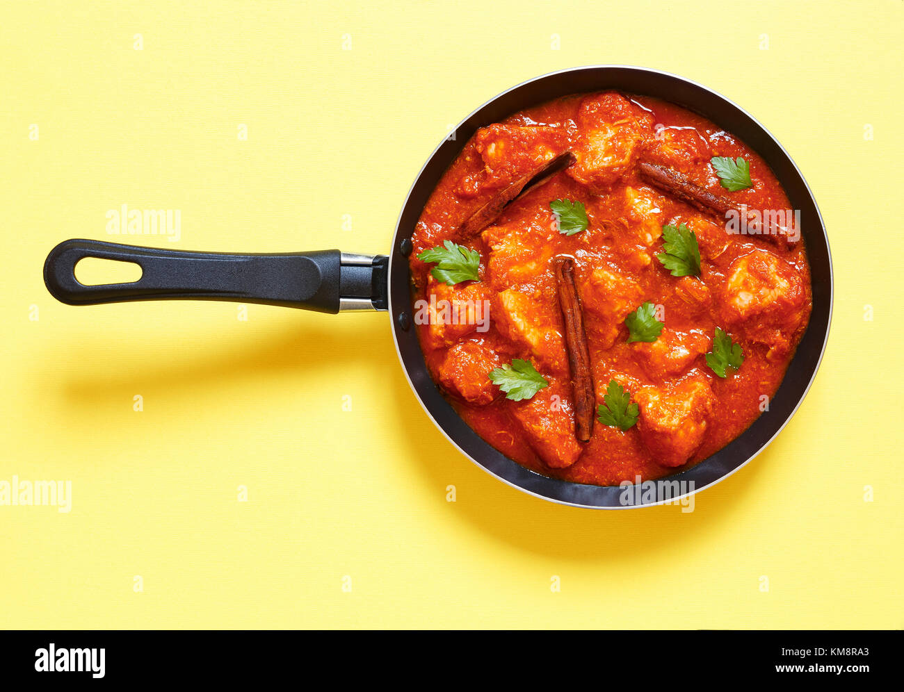 Style minimalism. Indian food. Chicken curry with cinnamon sticks ...