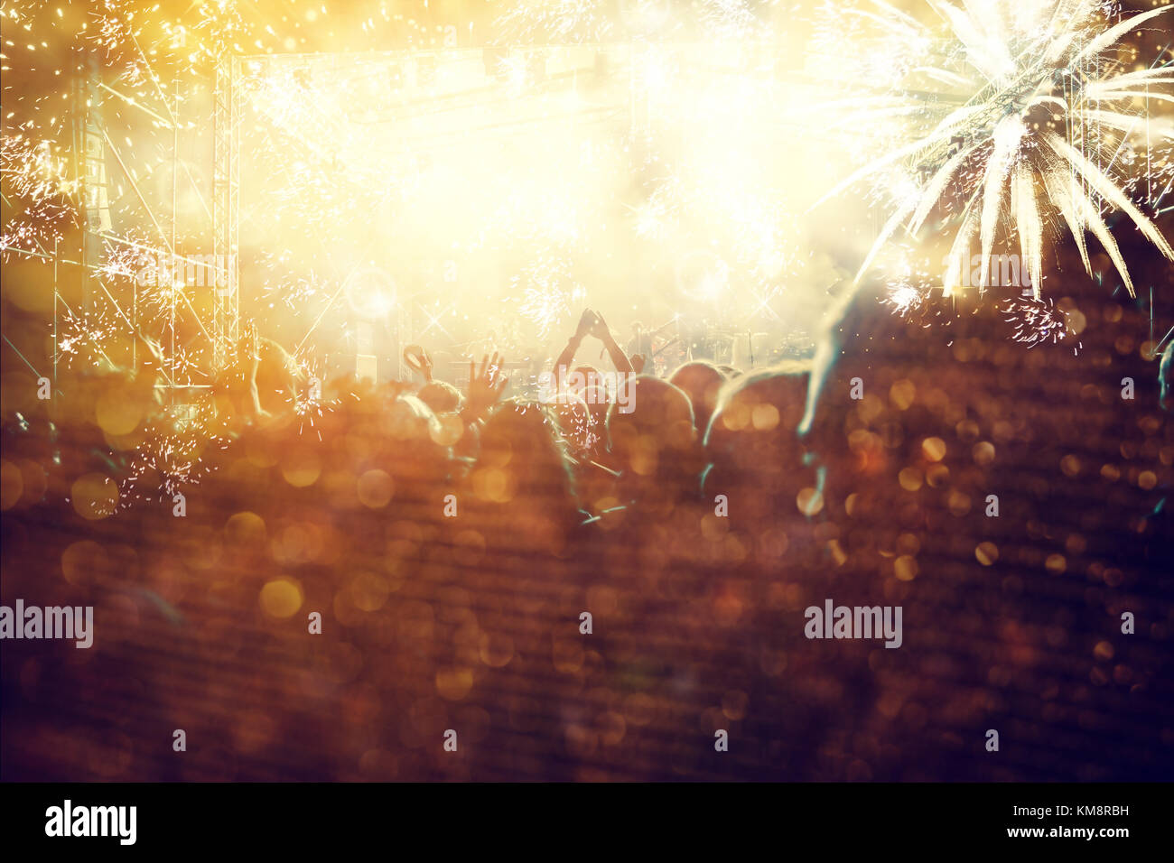 new Year concept - cheering crowd and fireworks Stock Photo - Alamy