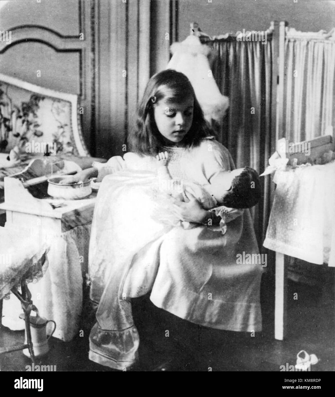 Princess Ingrid of Sweden is pictured playing with her doll in her room ...