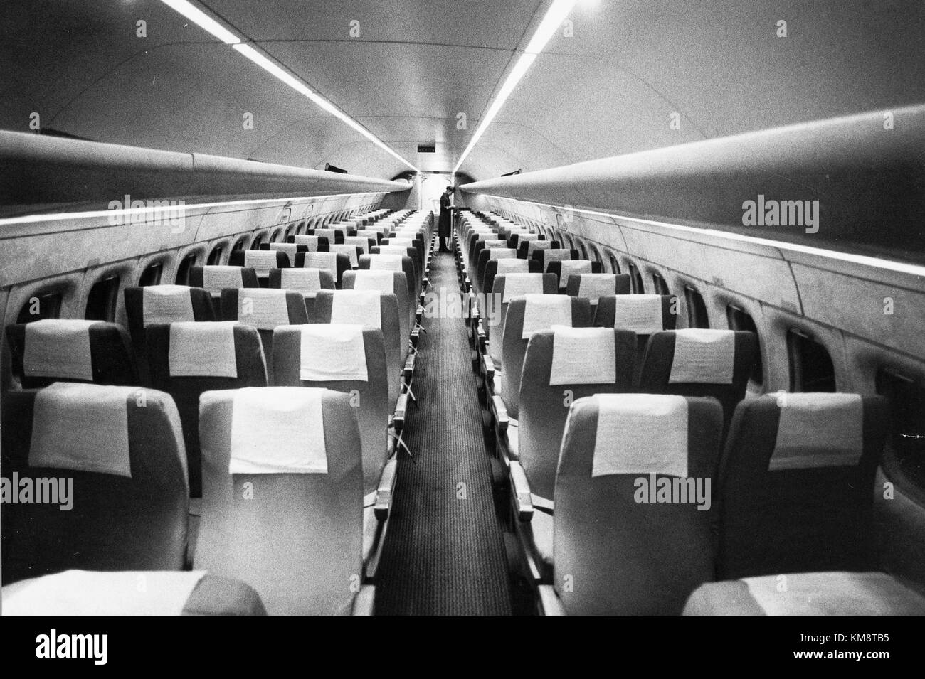 The interior of the SAS DC-8-33 aircraft showcases its cabin design ...