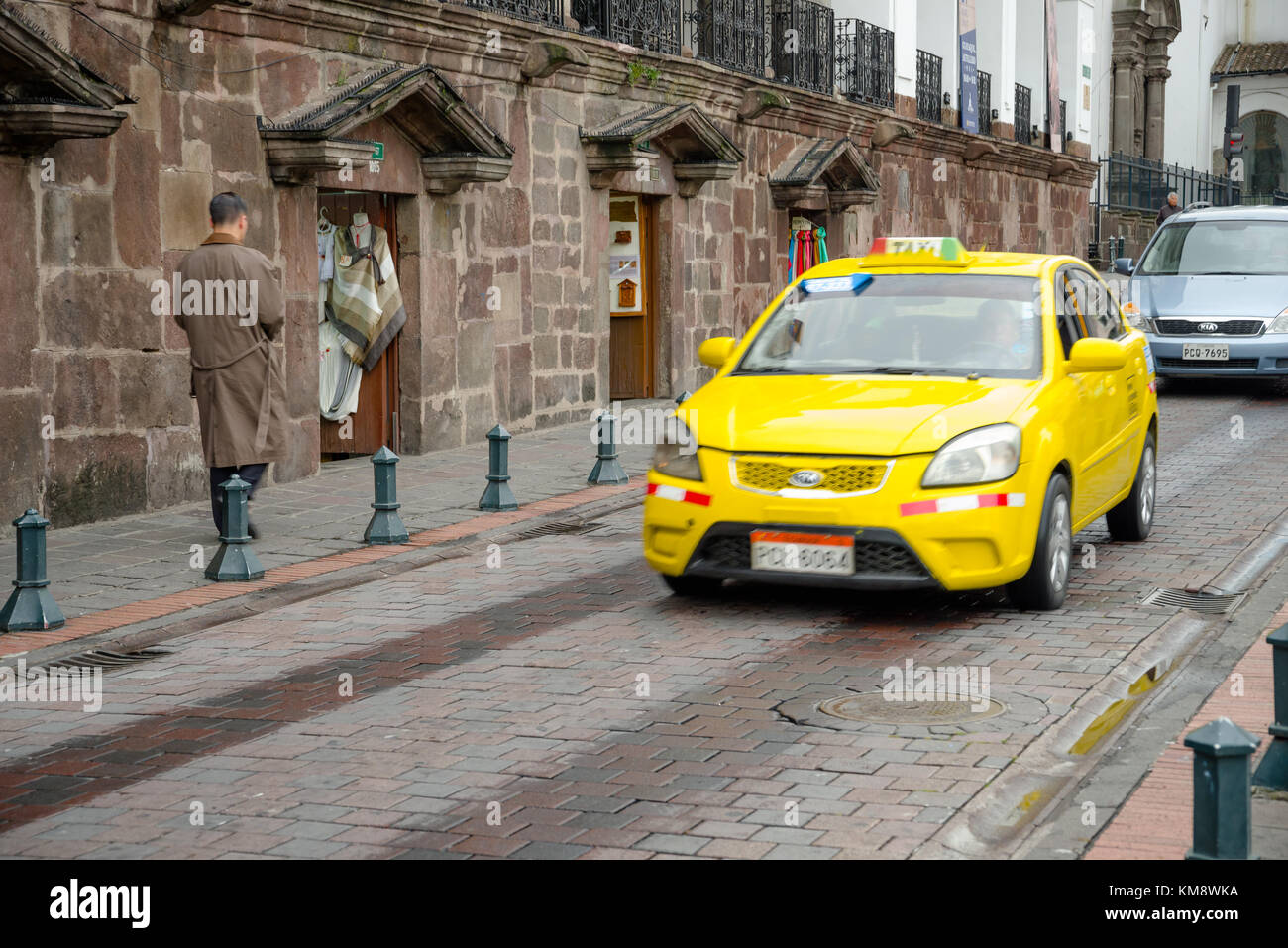 QUITO, ECUADOR NOVEMBER, 28, 2017: Some cars at historical center, in ...