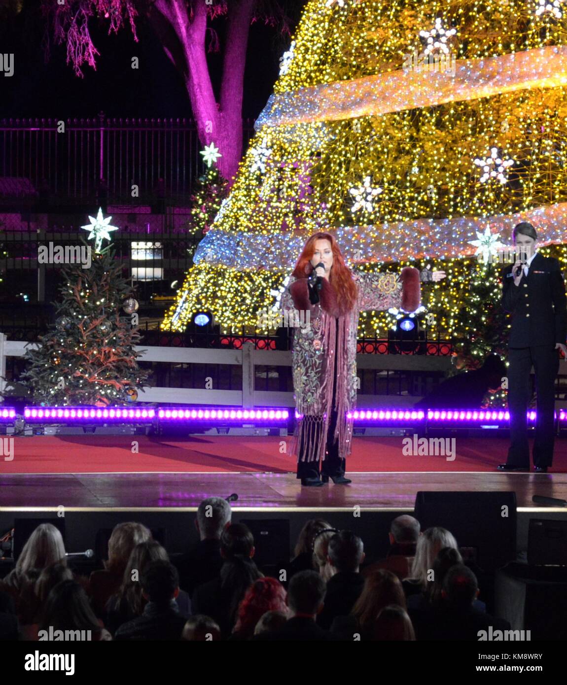 Country music singer Wynonna Judd performs with the U.S. Navy Band ...