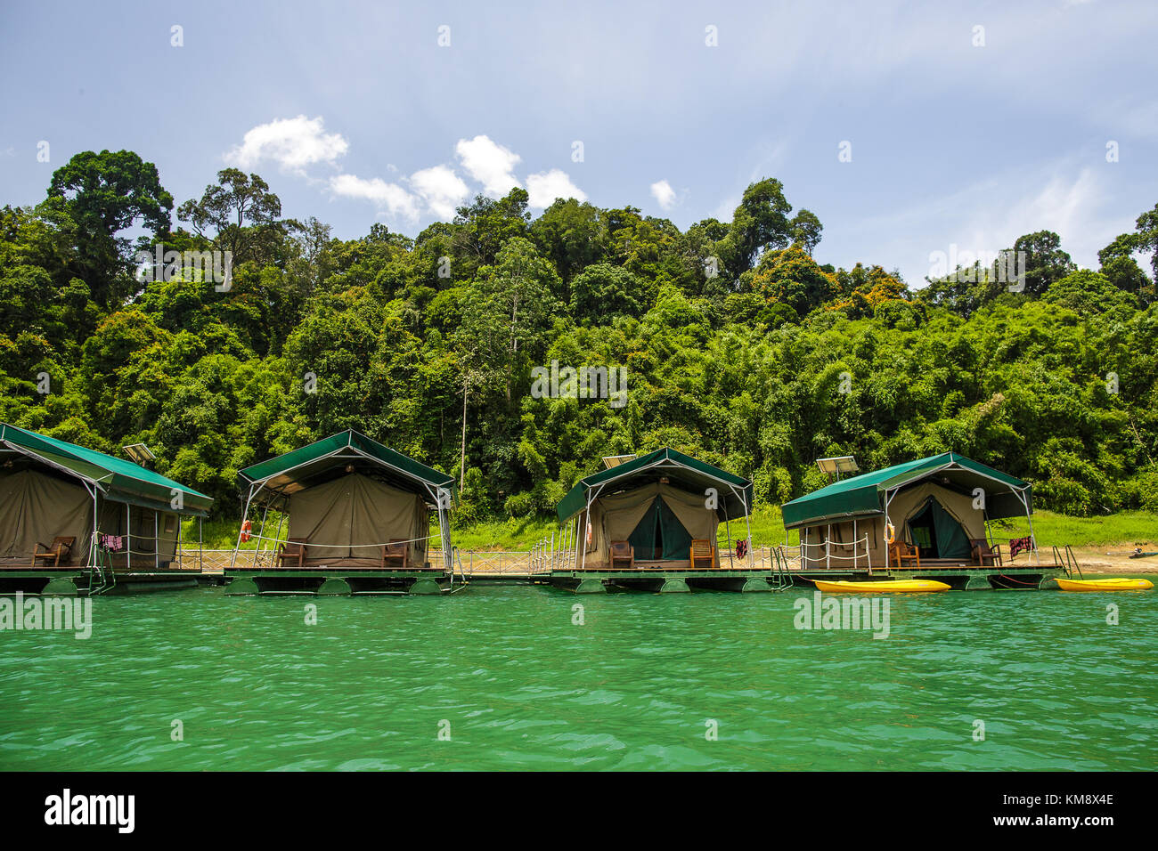Ratchaprapha, Thailand - July 18, 2017: Floating bungalows along the ...