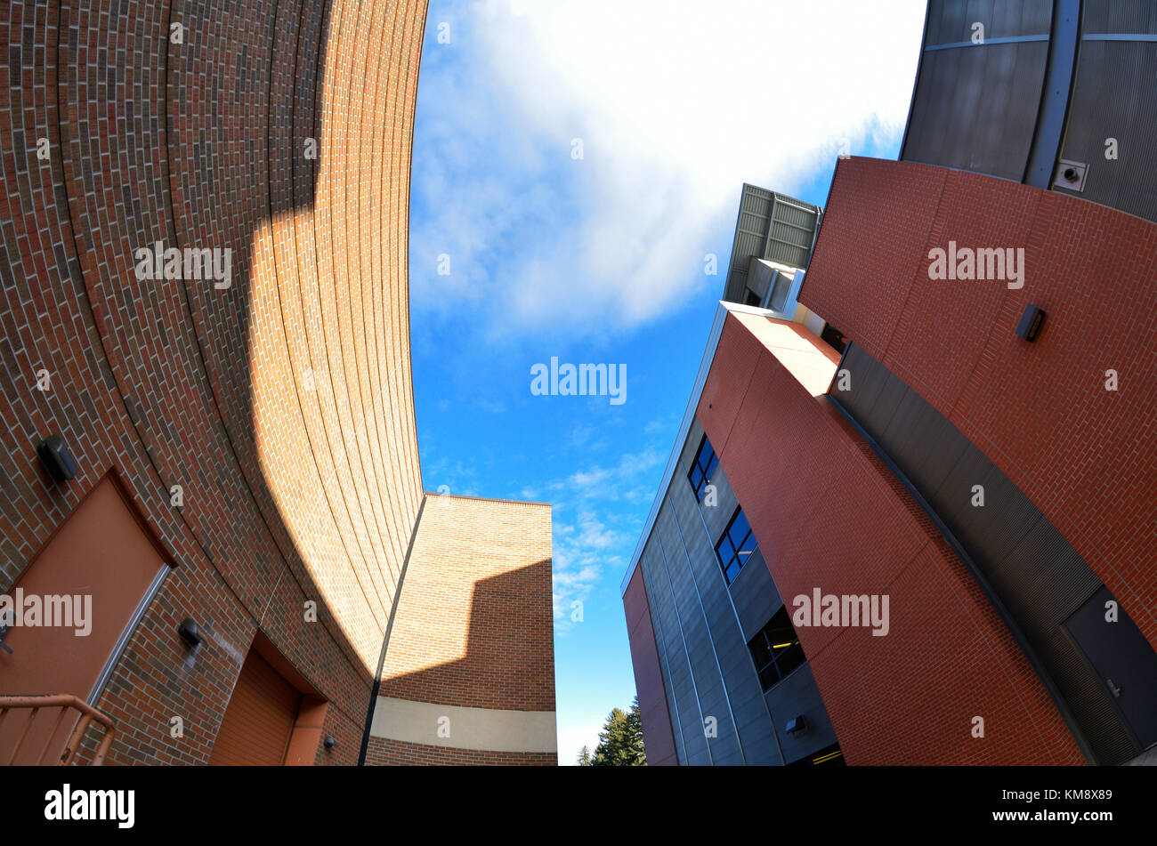 A picture of two buildings, distorted by a fish-eye lens Stock Photo ...