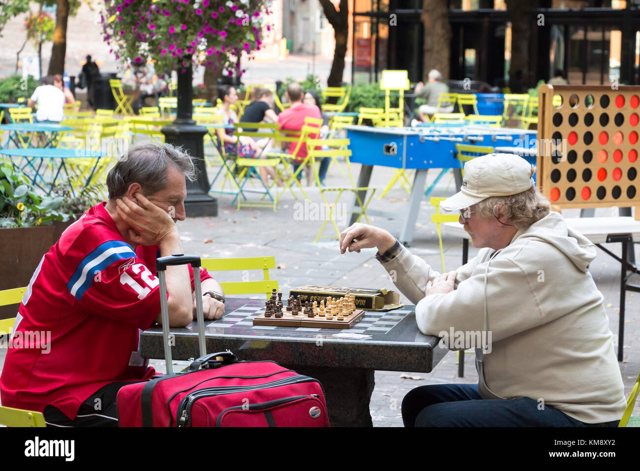 Sitting at a chess board hi-res stock photography and images - Alamy