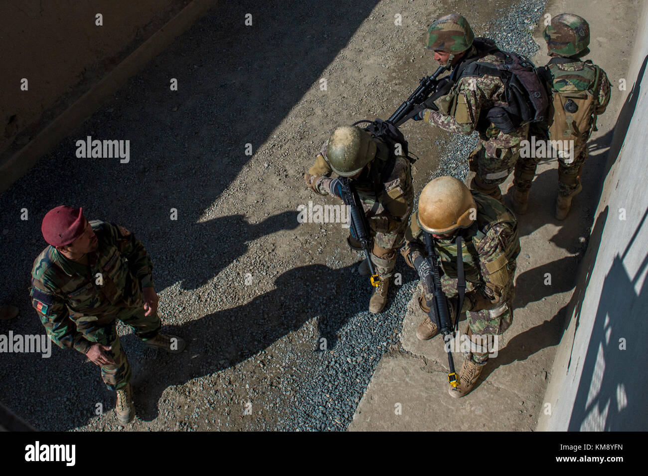 afghan commando trainees prepare to enter a compound during urban ...