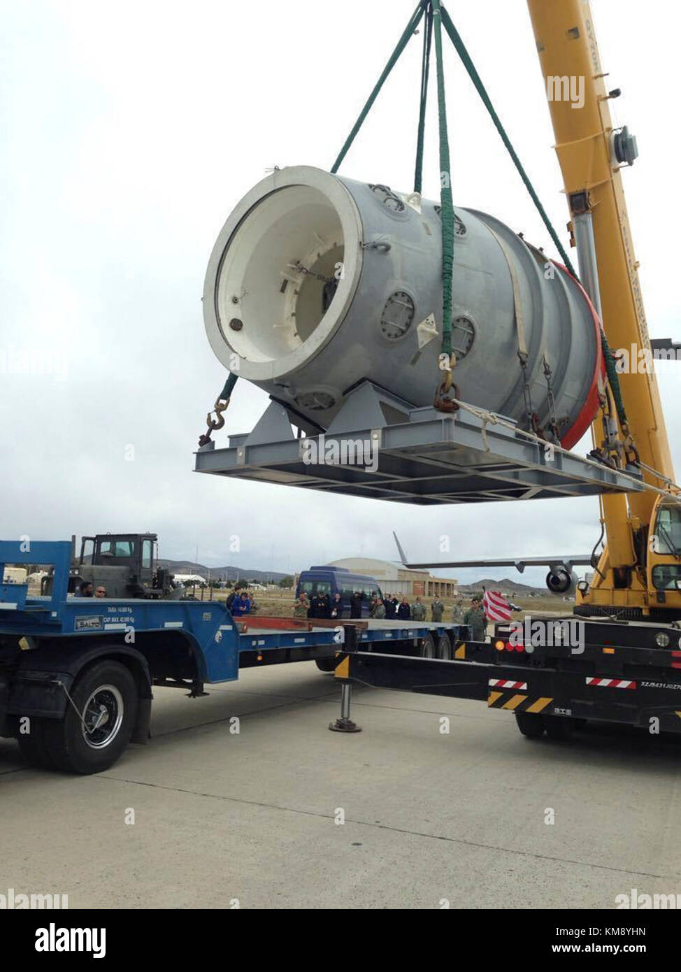 sailors from undersea rescue command (urc) and argentines load the ...